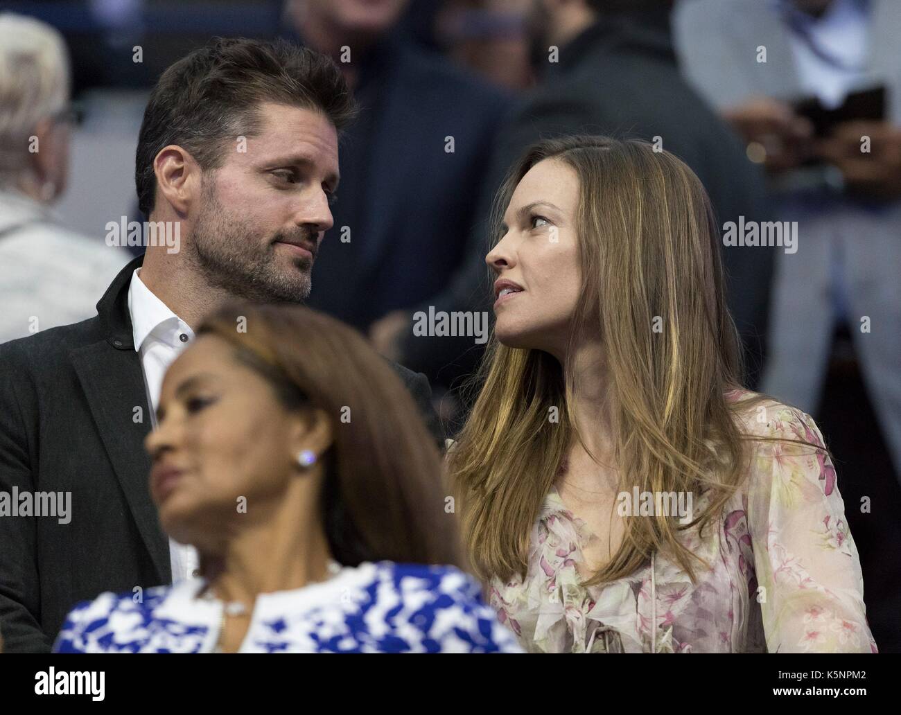 Philip Schneider, Hillary Swank in attendance for US Open Tennis ...