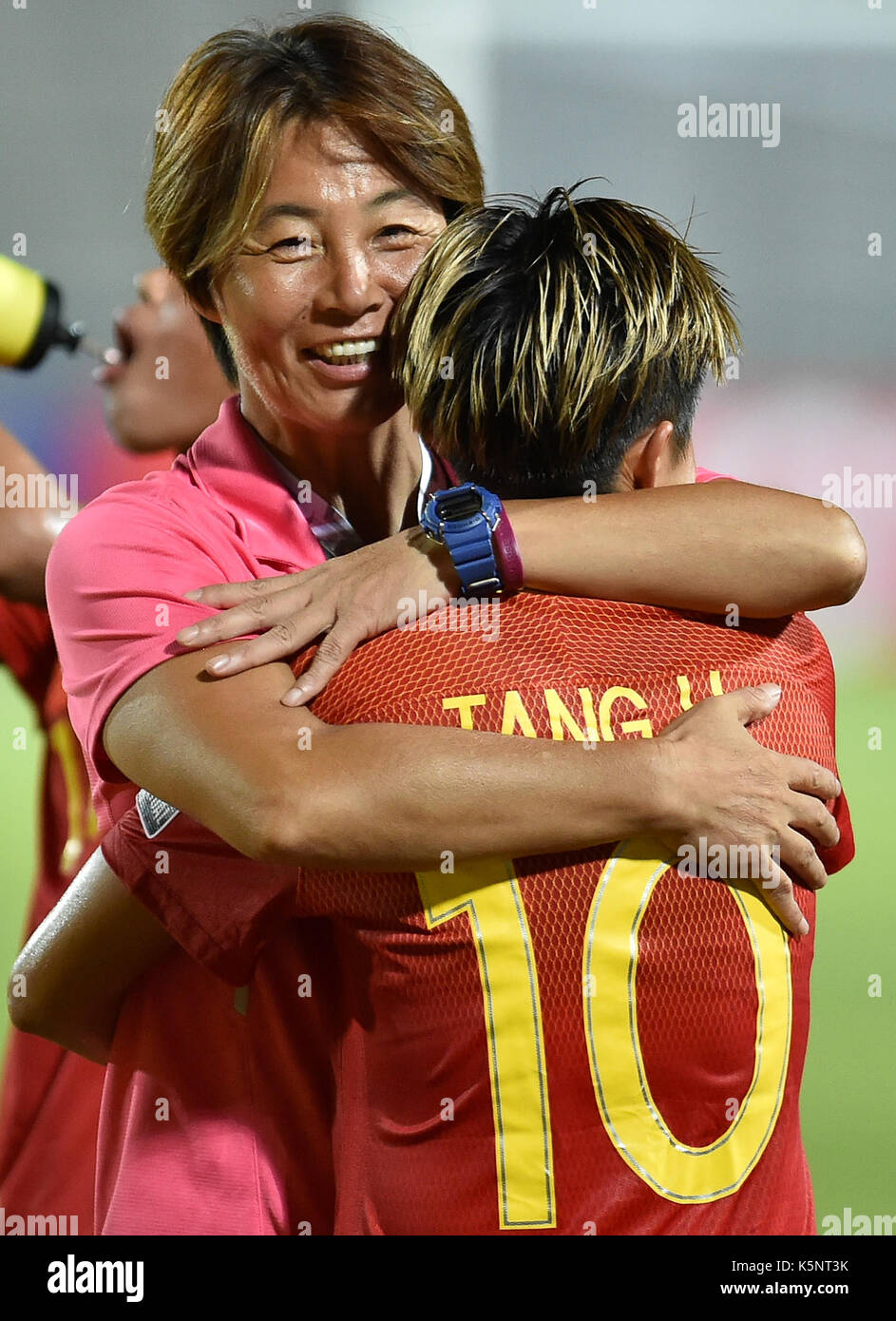 Chonburi, Thainland. 10th Sep, 2017. Gao Hong (L), head coach of of ...