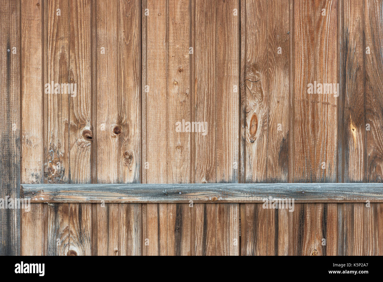 Background in style a rustic from old vertical wooden unpainted boards ...
