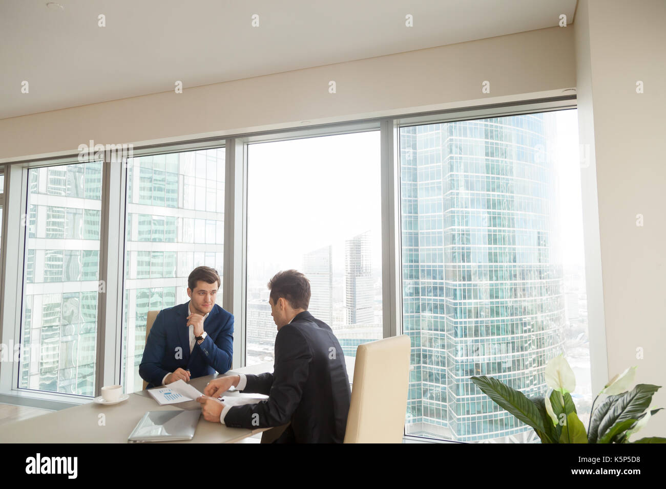 Successful business partners meeting in office Stock Photo - Alamy