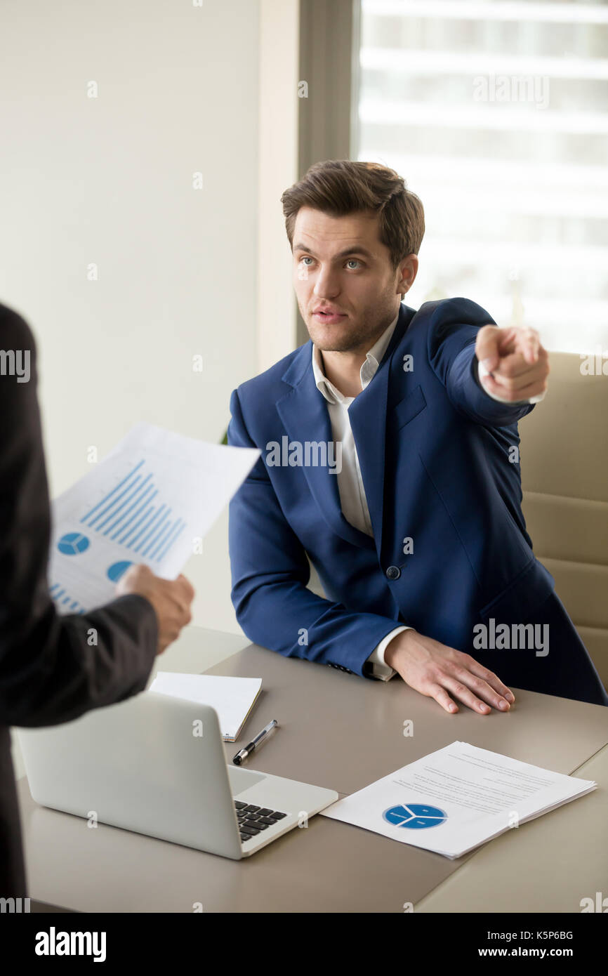 CEO arguing because of mistake in financial report Stock Photo - Alamy