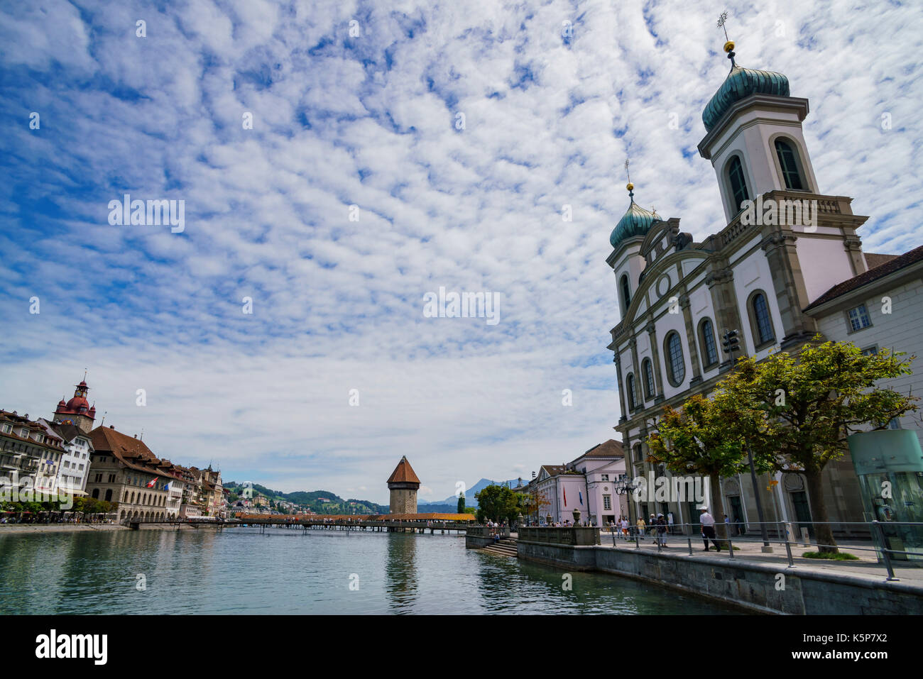 The beautiful Chapel Bridge, Lucerne Jesuit Church and cityscape at ...