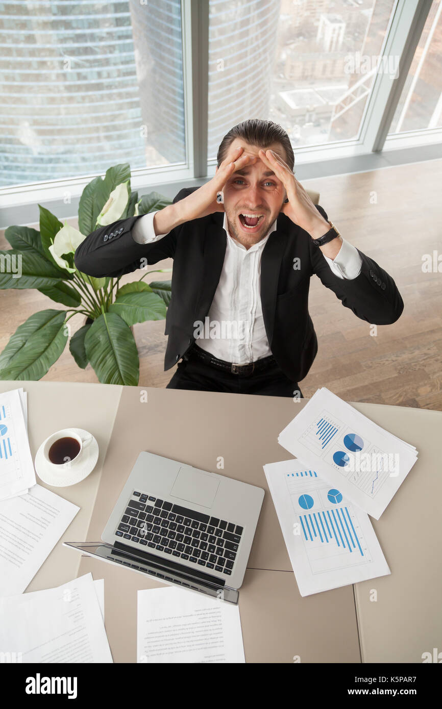 Distraught businessman hi-res stock photography and images - Alamy