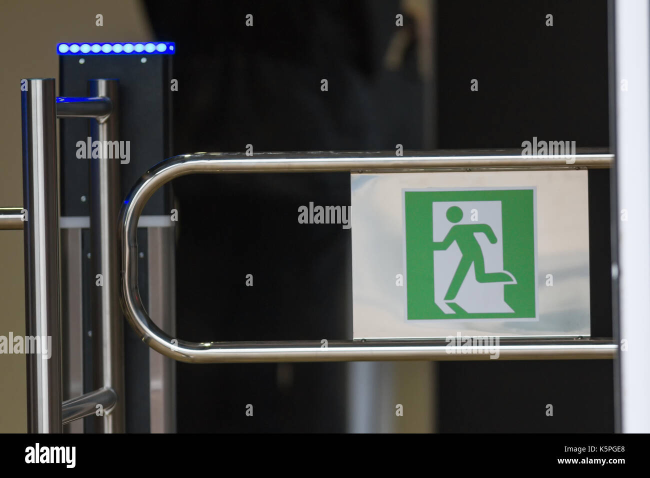 Sign - exit, green emergency exit on turnstile Stock Photo - Alamy