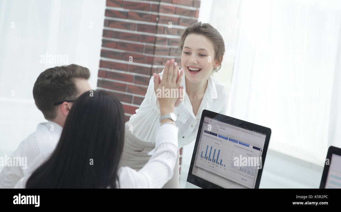professional business team, giving each other "five Stock Photo - Alamy