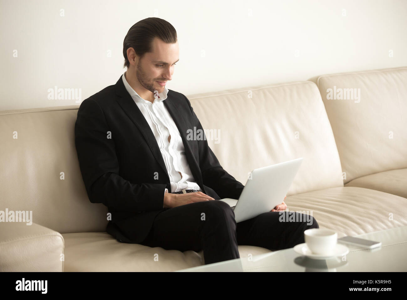 Successful male entrepreneur remotely working hi-res stock photography ...