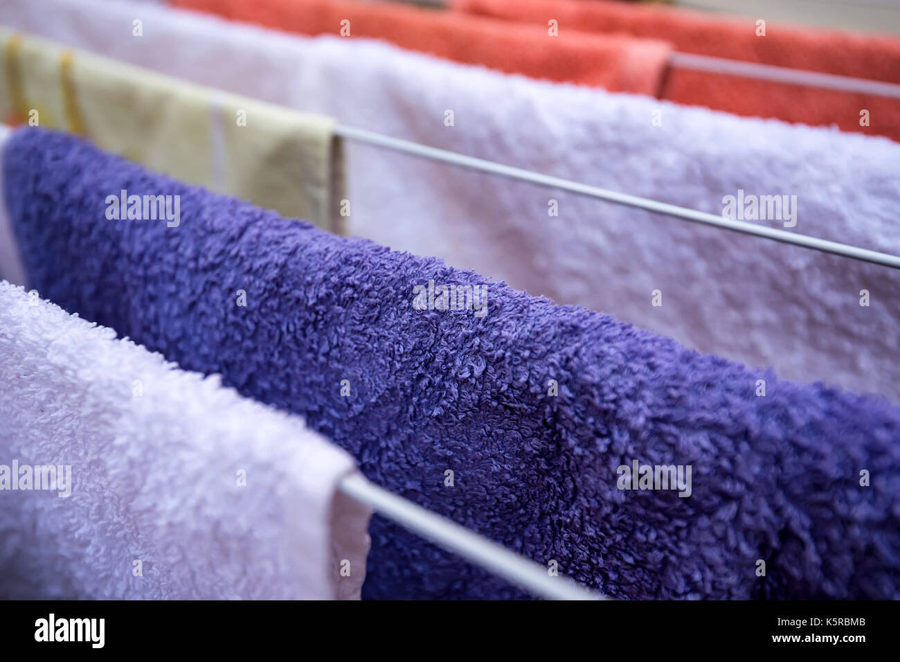 Close up colorful laundry drying Stock Photo - Alamy