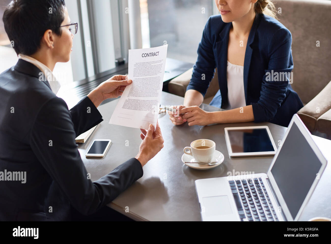 Reading before signing hi-res stock photography and images - Alamy