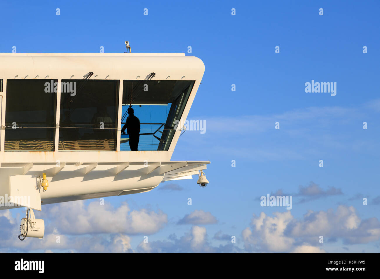 Captain in Navigation Bridge of Cruise Ship Stock Photo - Alamy