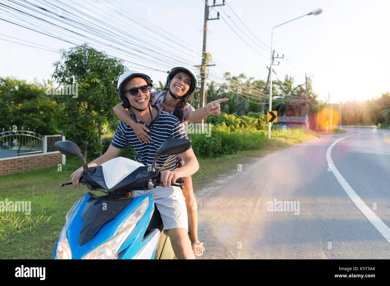 Couple riding motorcycle, men hi-res stock photography and images - Alamy
