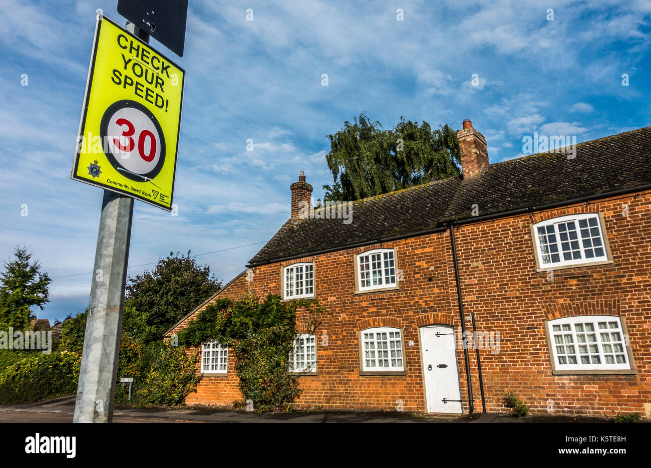 Community Speed Watch 'Check your speed' warning sign on a 30 miles per ...