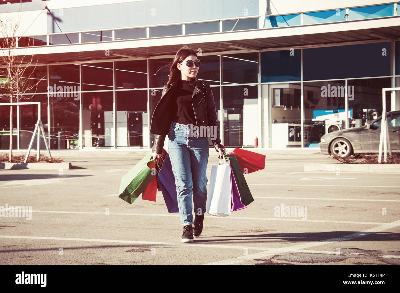 Happy girl making shopping Stock Photo - Alamy