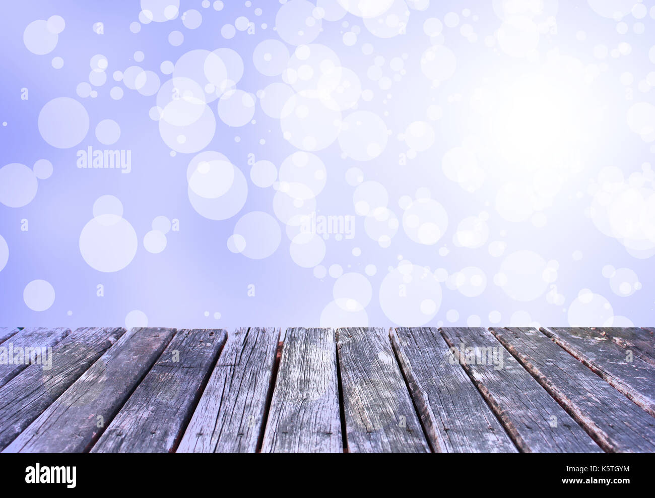 wood table blue abstract blur bokeh background Stock Photo - Alamy