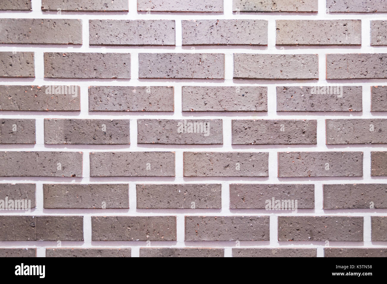 Brick wall background, texture of gray stone blocks closeup Stock Photo ...