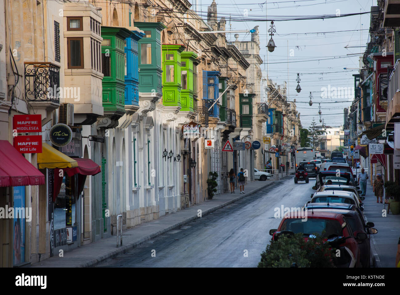 MOSTA, MALTA - AUGUST 21, 2017: The narrow streets with their colorful ...