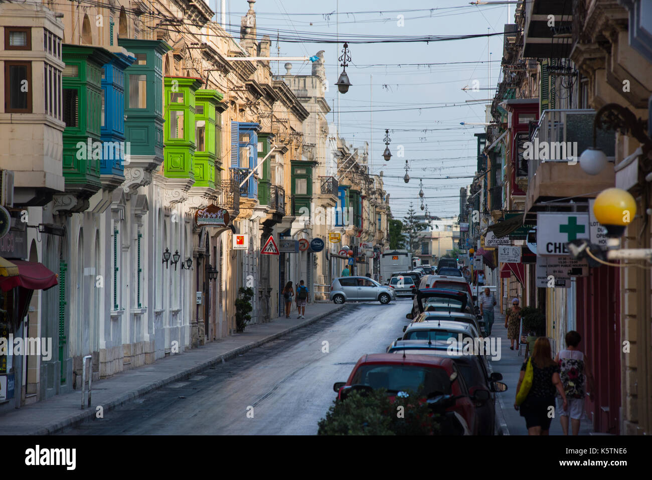 MOSTA, MALTA - AUGUST 21, 2017: The narrow streets with their colorful ...