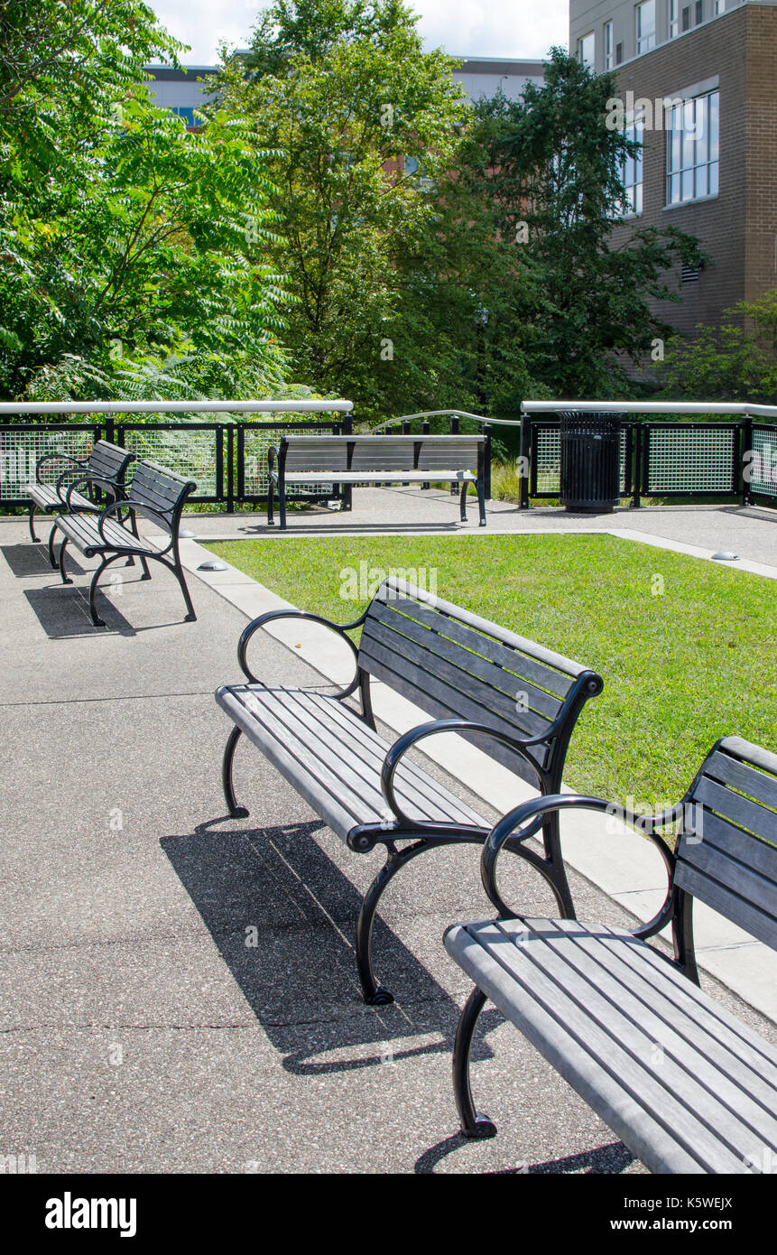 Benches around grass in Pittsburgh's Southside Stock Photo - Alamy
