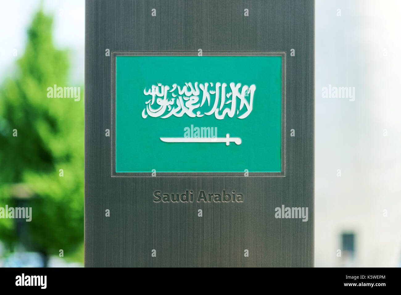 Saudi arabia flag on pole hi-res stock photography and images - Alamy