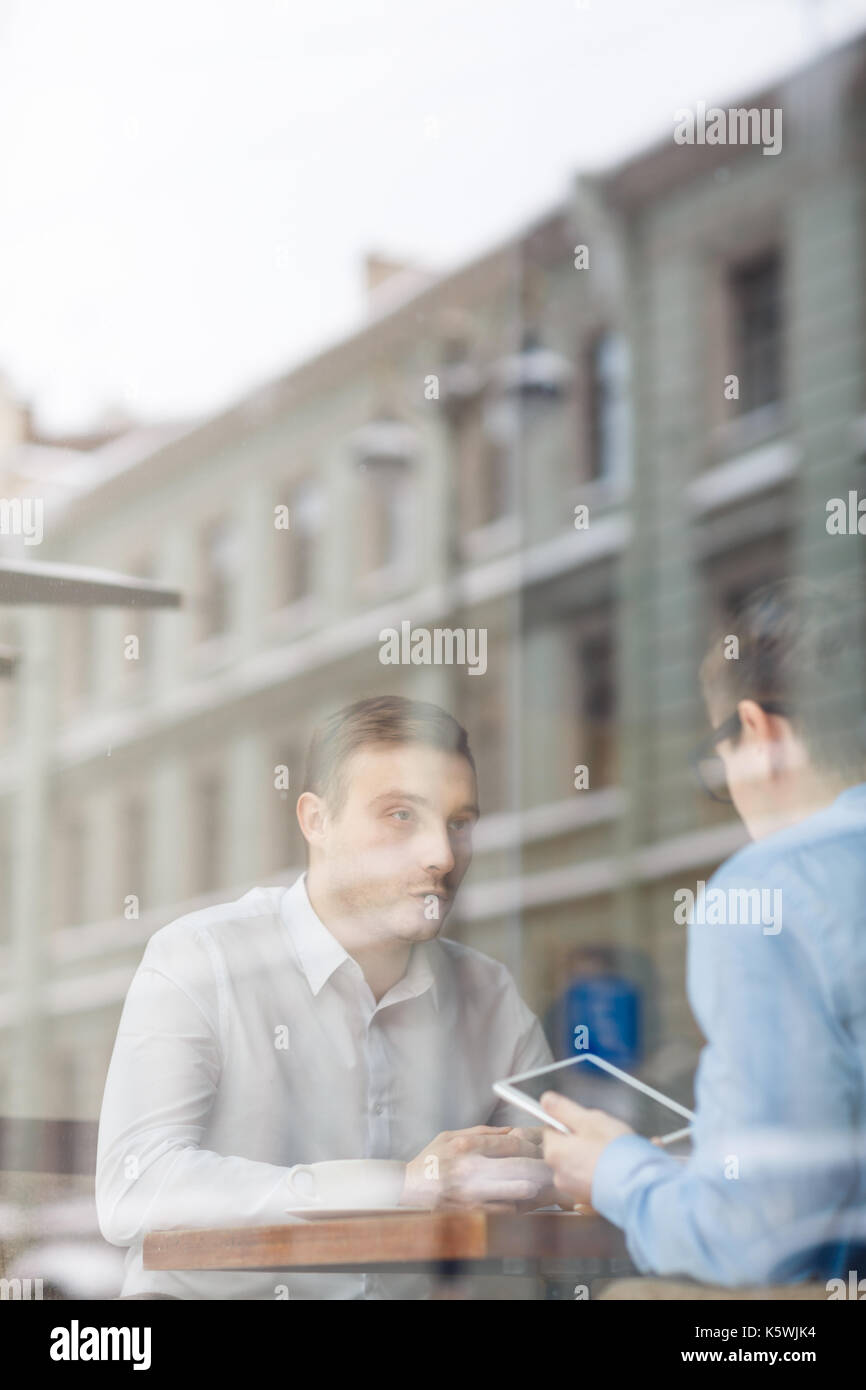 Brainstorming in cafe Stock Photo - Alamy