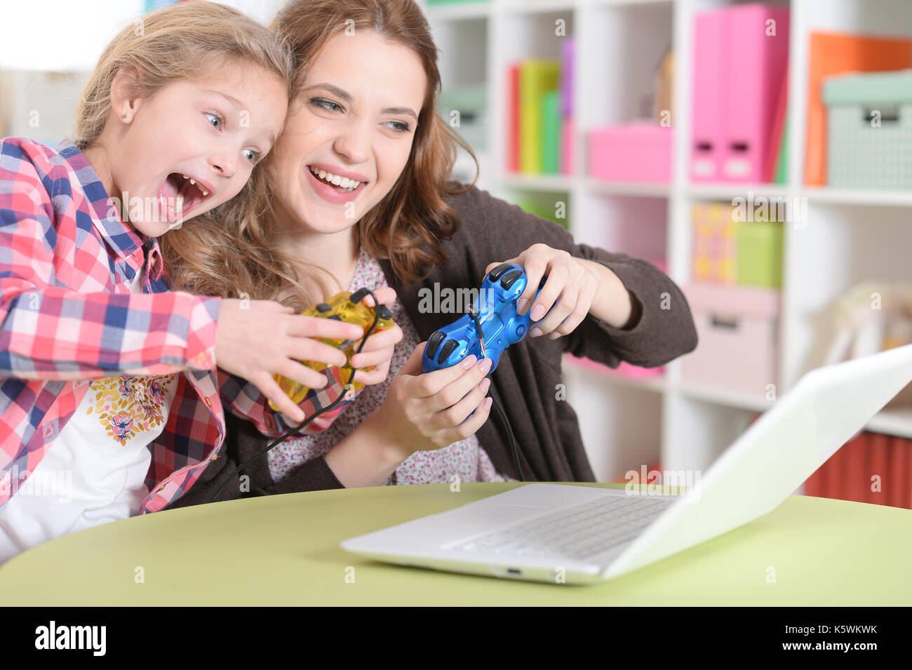 Woman playing game on smart hi-res stock photography and images - Alamy