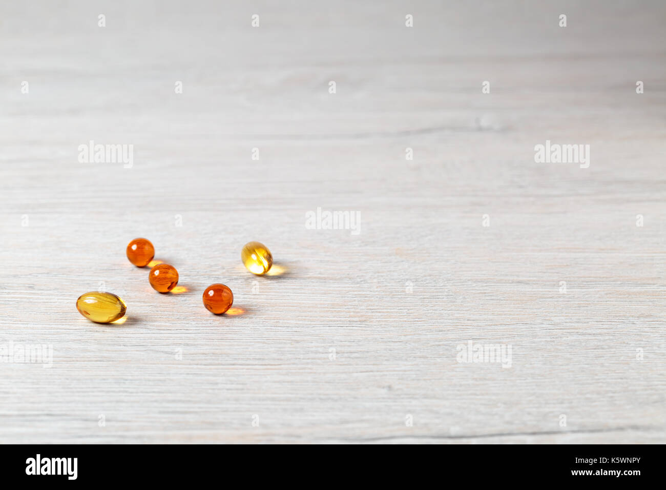 Different fish oil capsules hi-res stock photography and images - Alamy