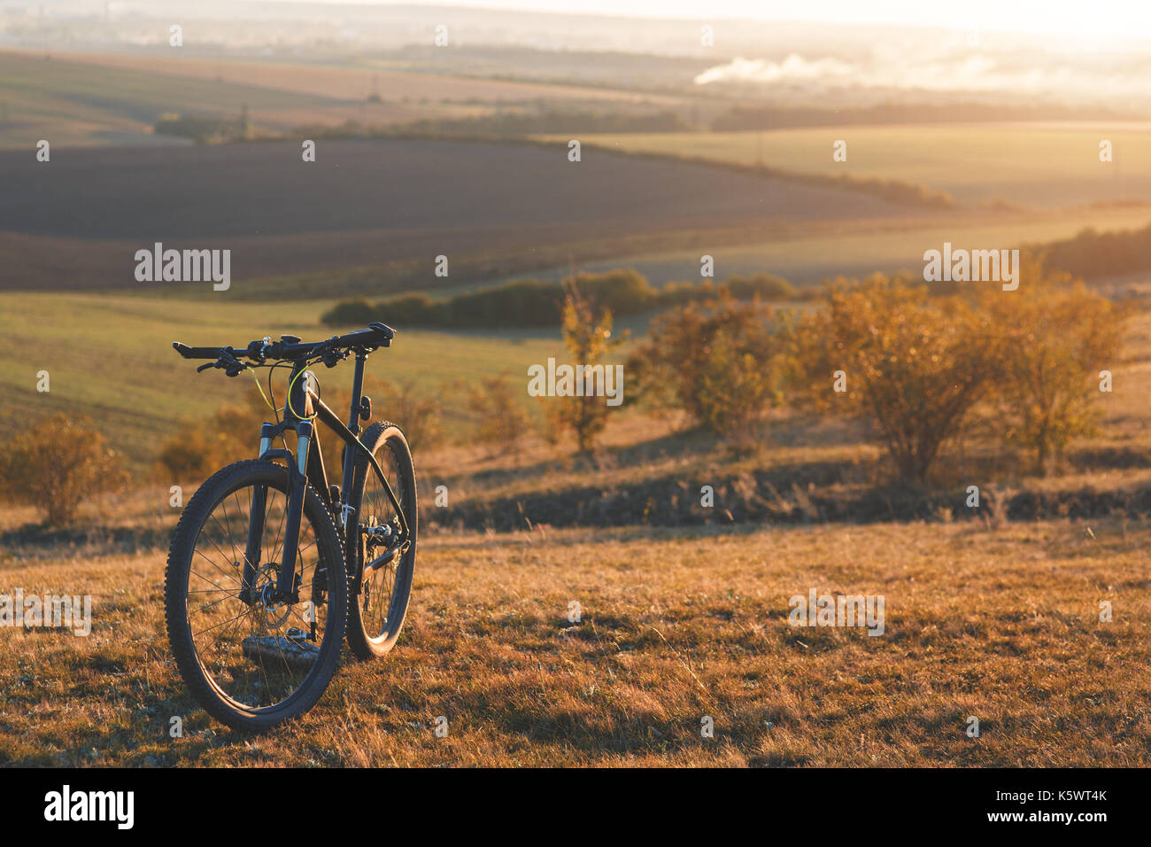 Sunrise, sunset, Cycling around the world Is a journey to freedom Stock ...