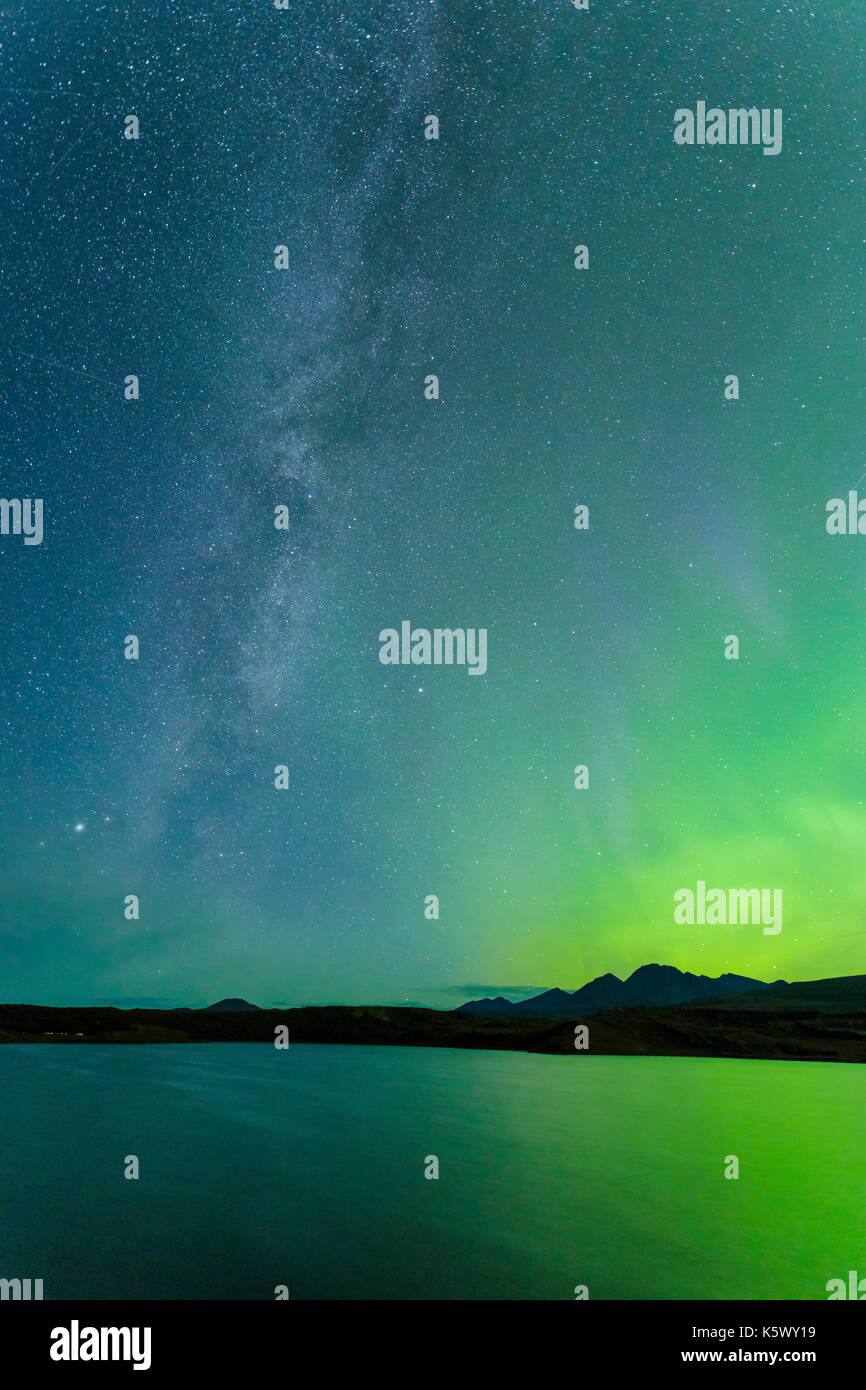 Milky Way and Aurora Borealis above the Alaska Range mountains at Round ...