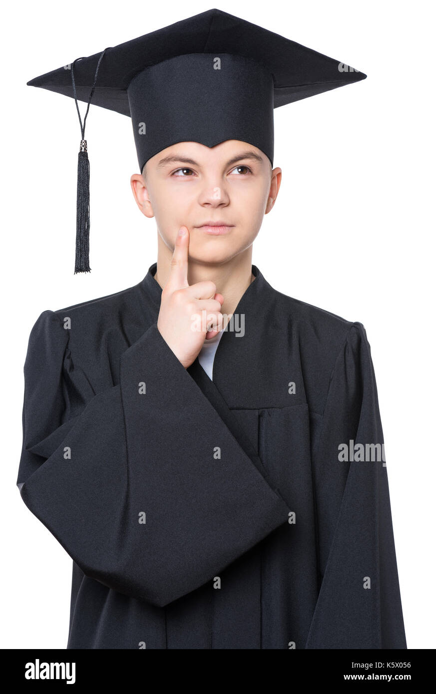 Close up portrait of thoughtful graduate teen boy student in black ...