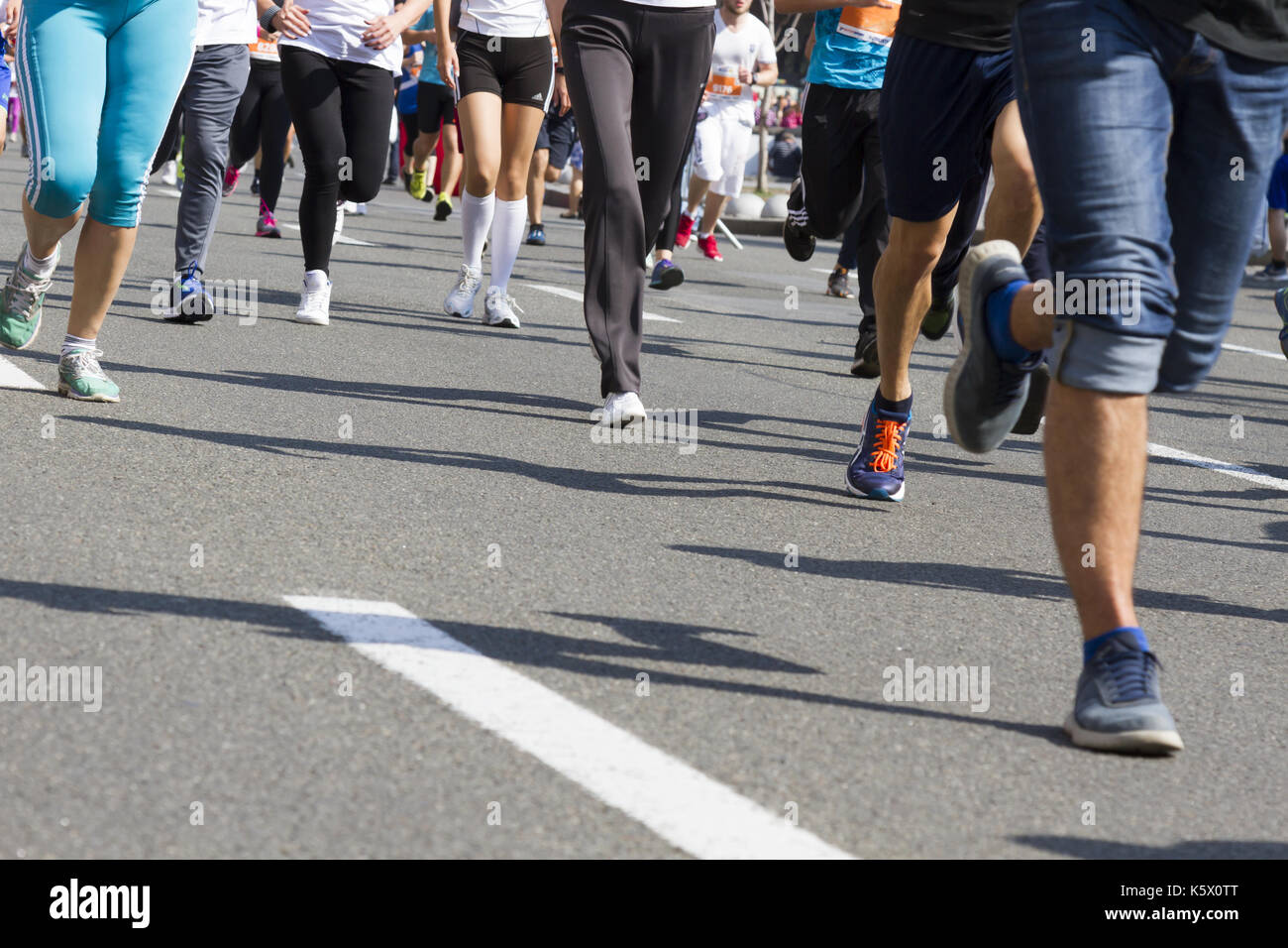 Marathon running race, people feet on road, sport, fitness and healthy ...