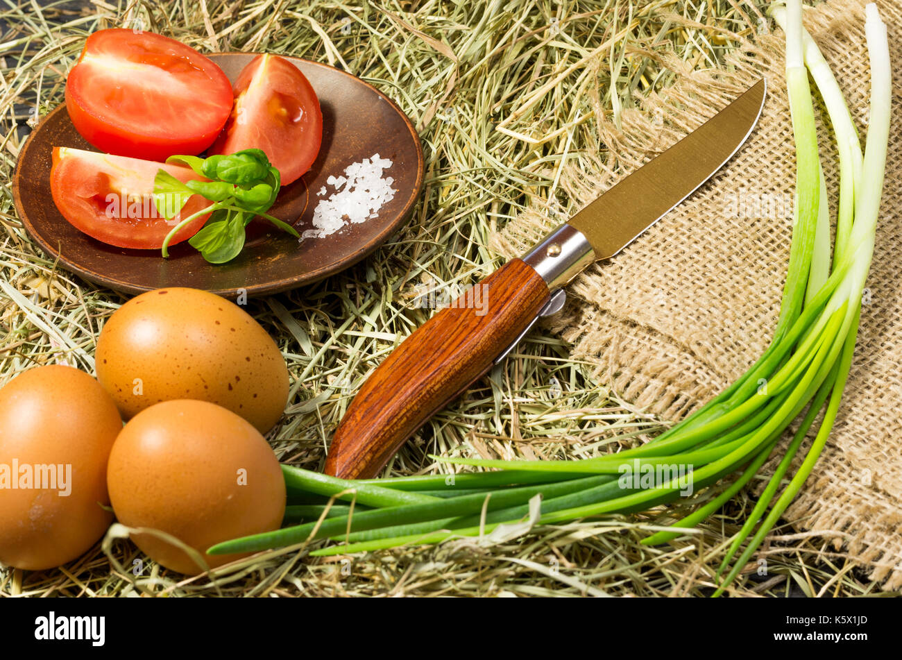 Composition in a rural style. Classic knife and vegetables. Cutting ...