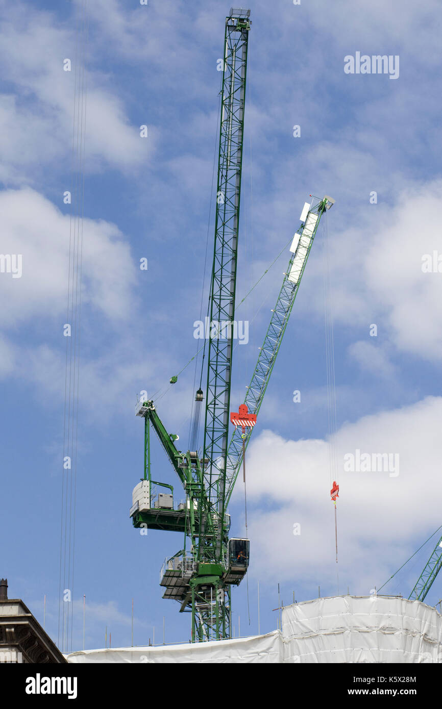 construction cranes on a building site Stock Photo - Alamy