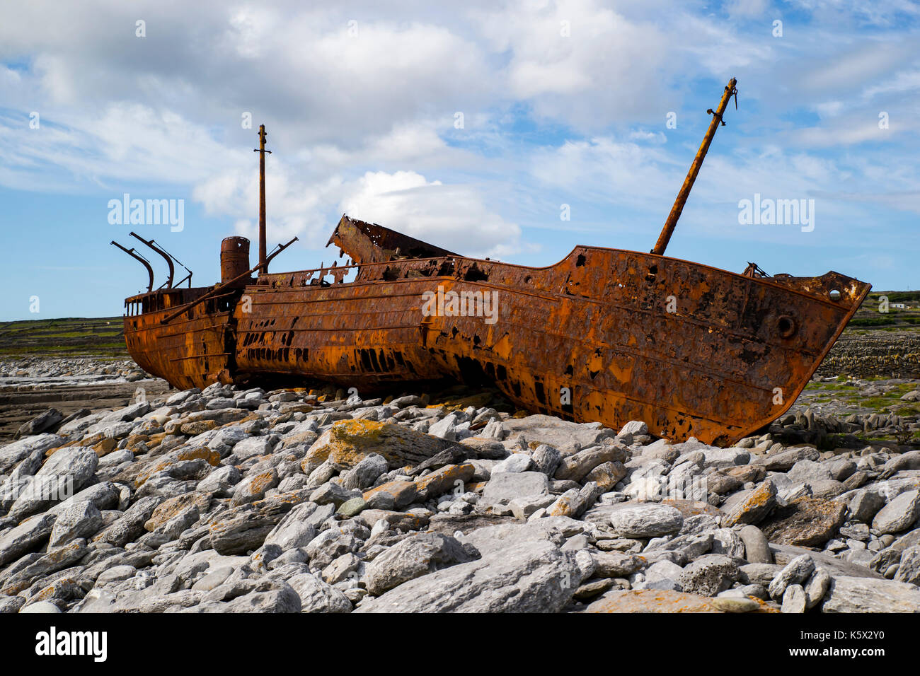 Shipwreck on the Rocks Stock Photo - Alamy