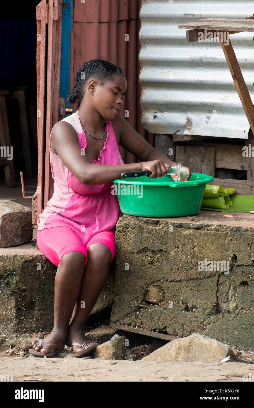 Woman cleaning fish, Soanierana Ivongo, Madagascar Stock Photo - Alamy