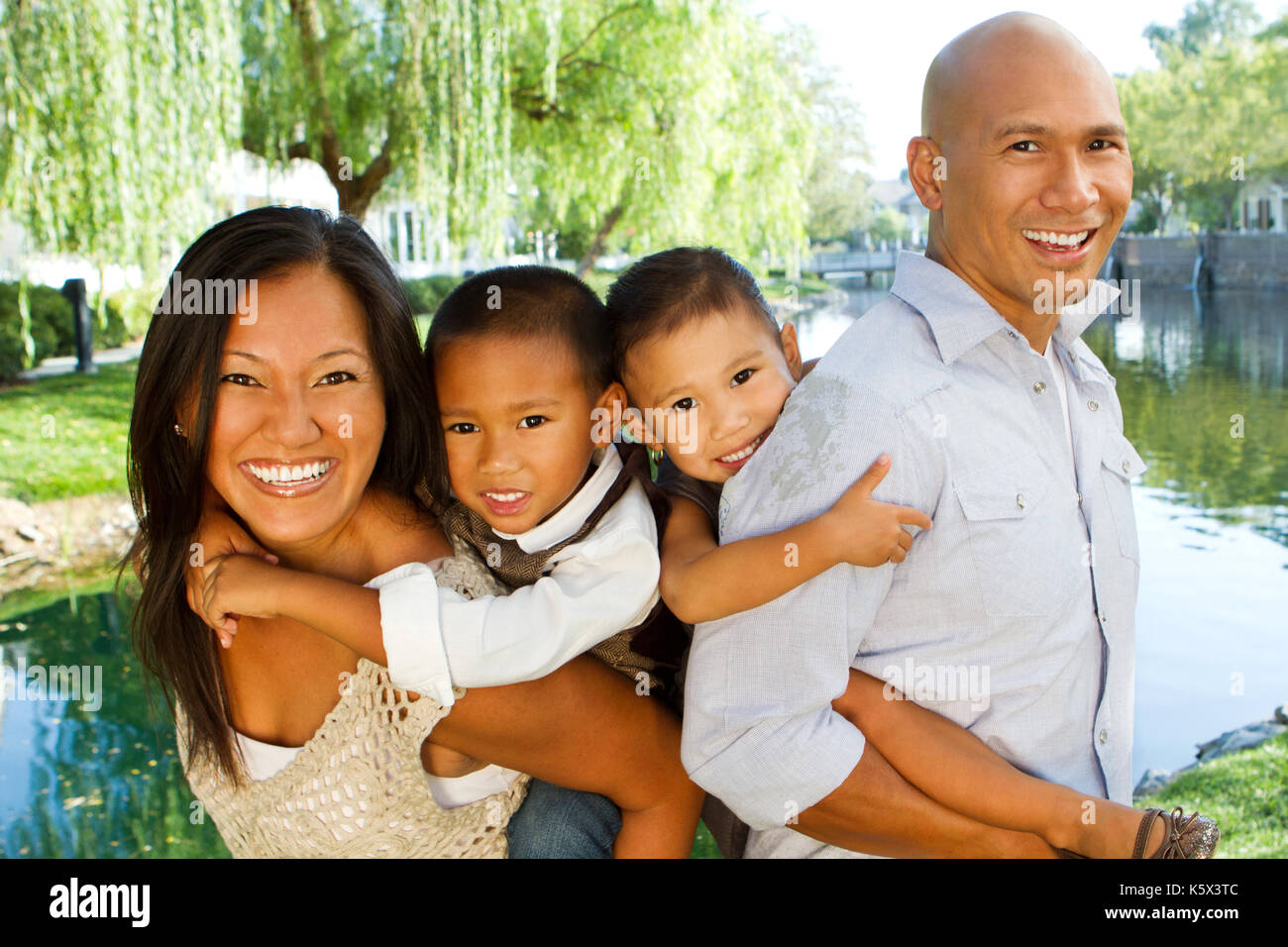 Happy Asian Family Stock Photo - Alamy