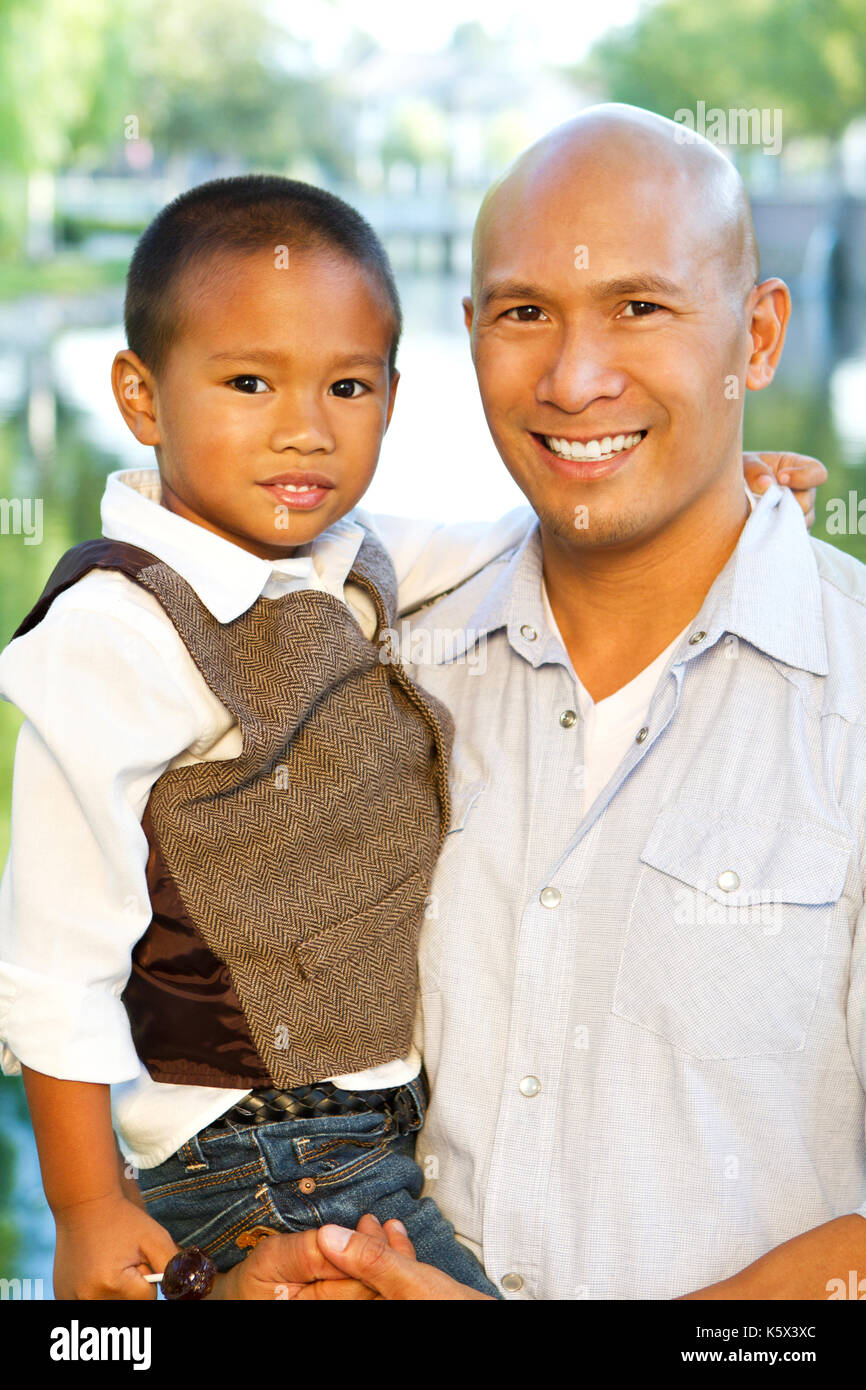Asian father and his son Stock Photo - Alamy