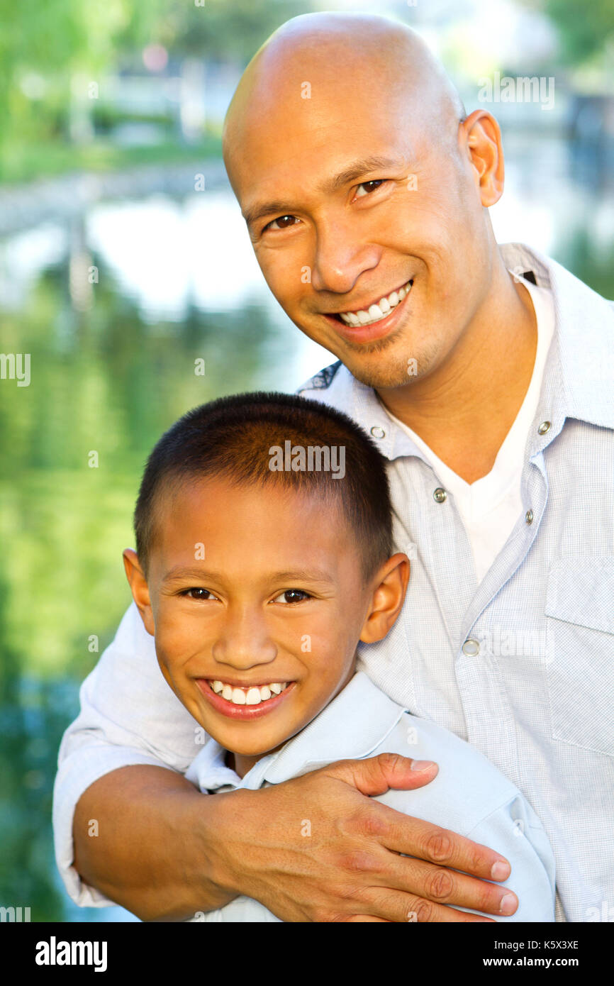 Asian father and his son Stock Photo - Alamy