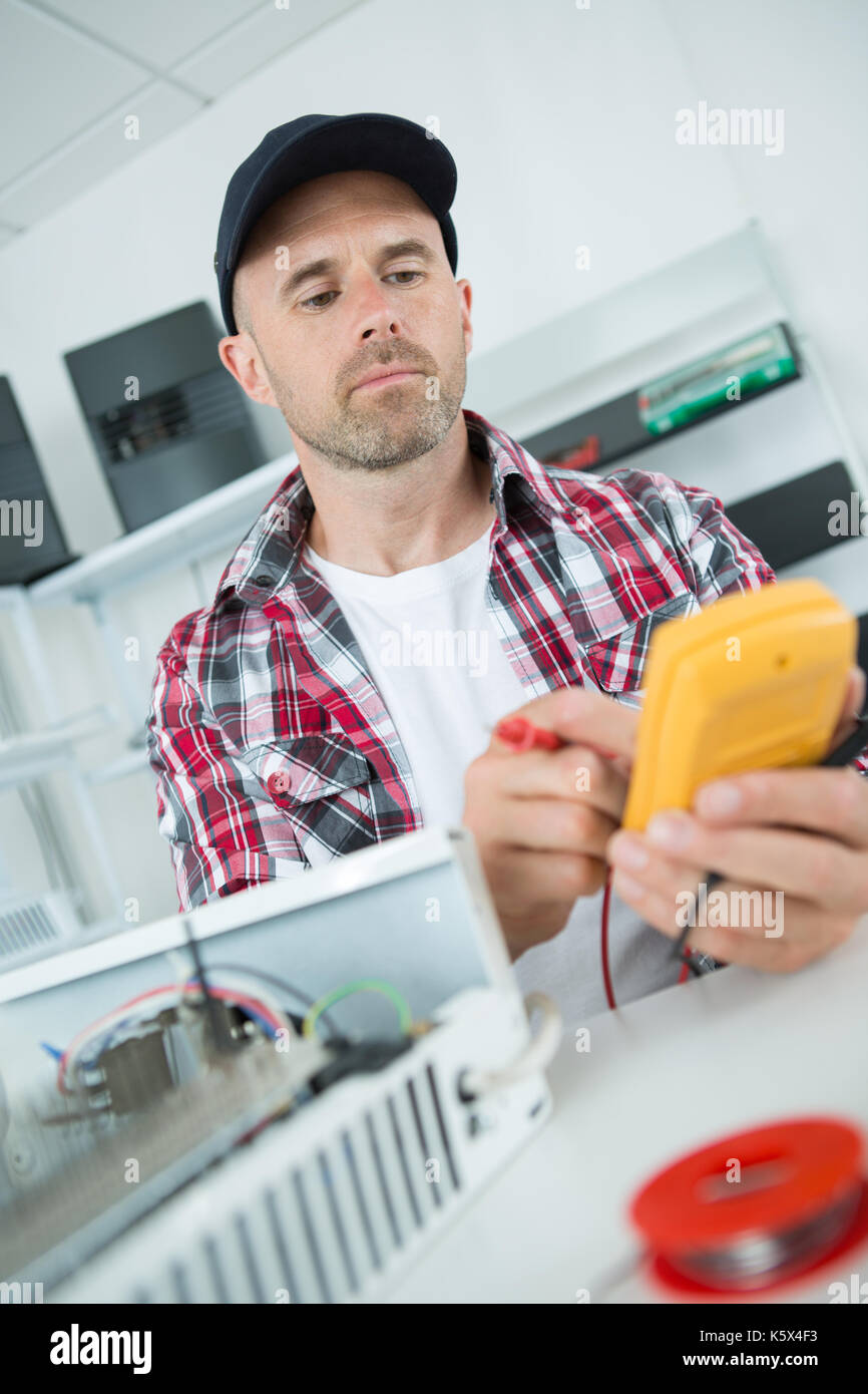 Man radiator repairing hi-res stock photography and images - Alamy