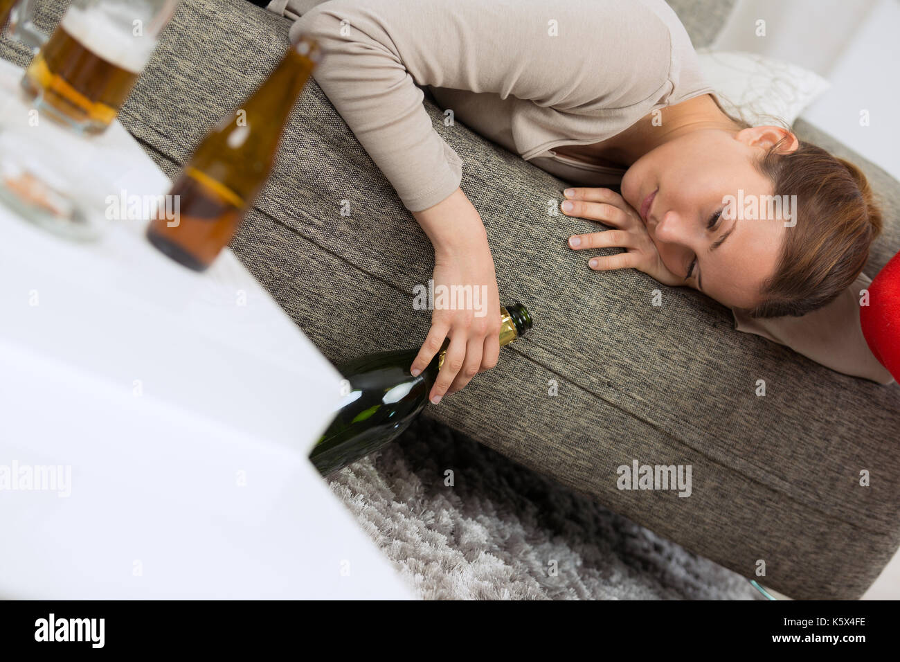 tired woman after party at home Stock Photo - Alamy