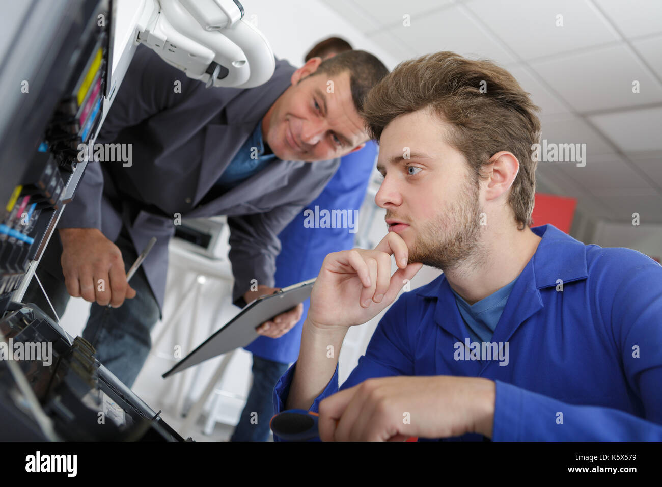 man training a new recruit Stock Photo - Alamy