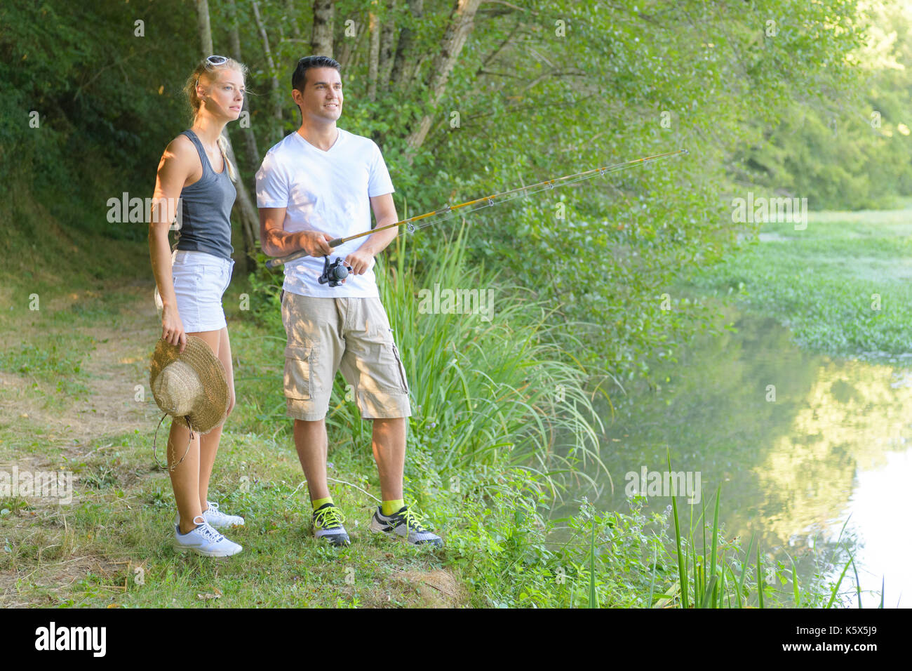 patience in fishing Stock Photo - Alamy
