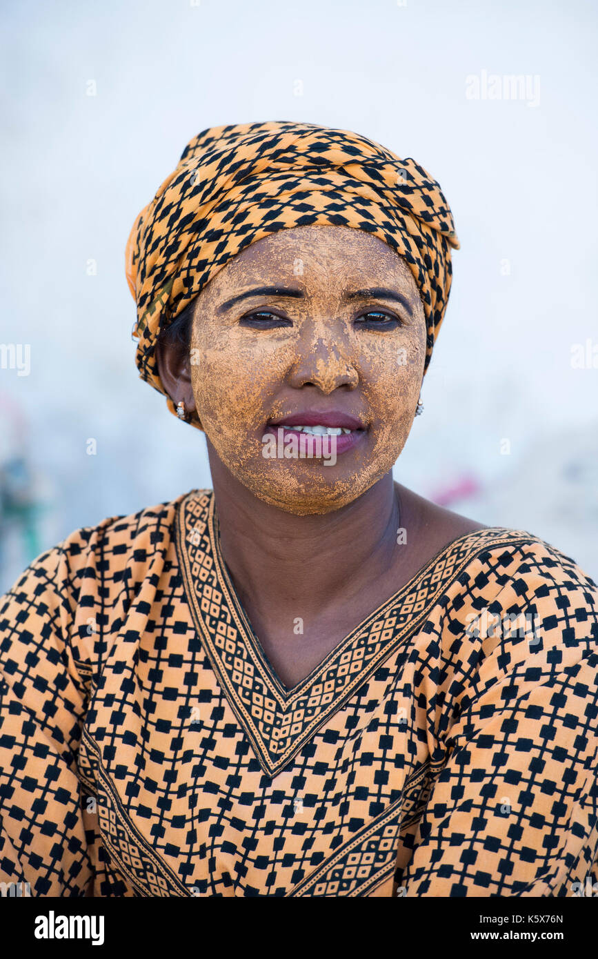 Woman wearing Sakalava style face paint, Mahajanga, Madagascar Stock ...