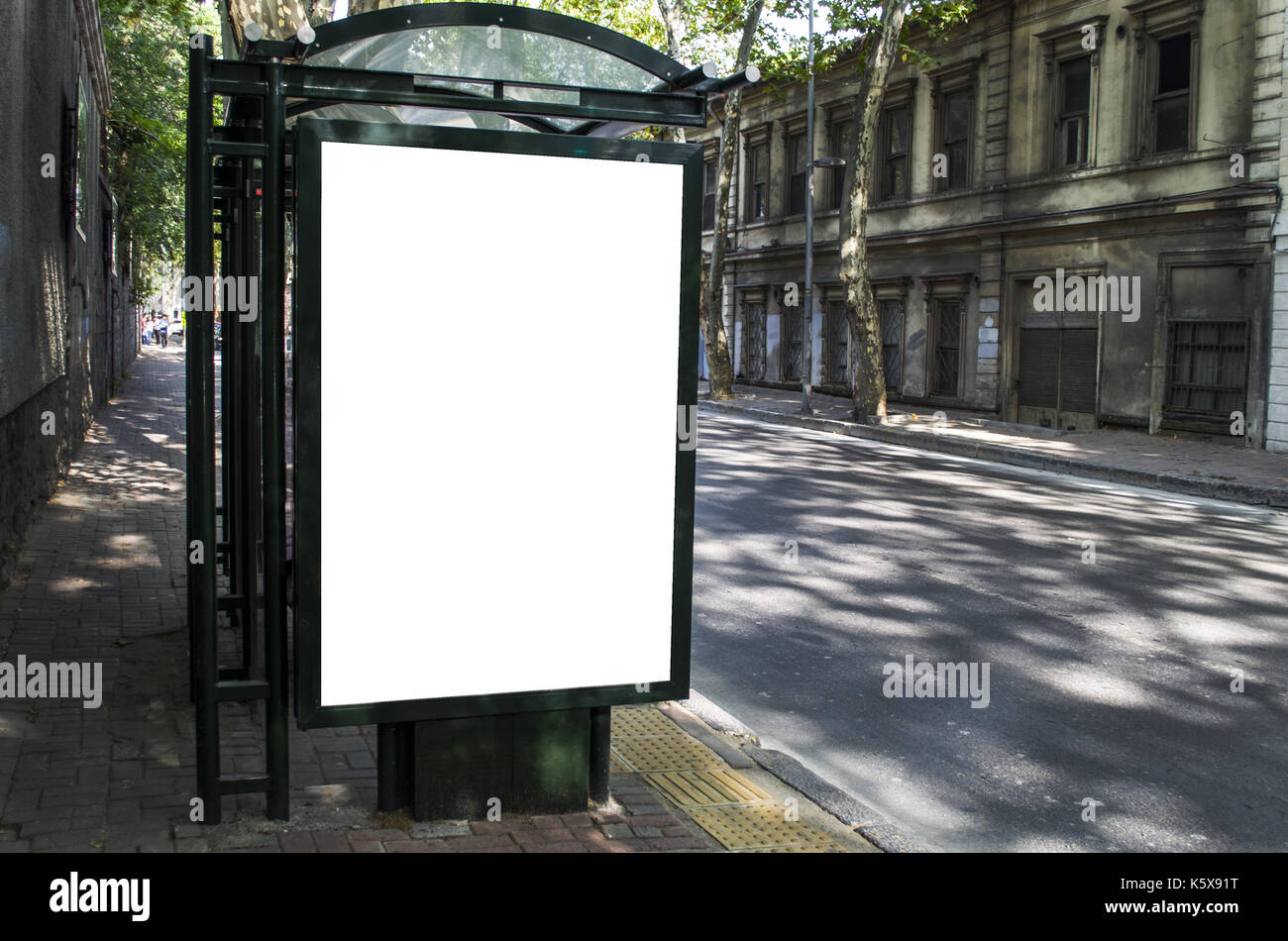 Blank billboard on city bus station Stock Photo - Alamy