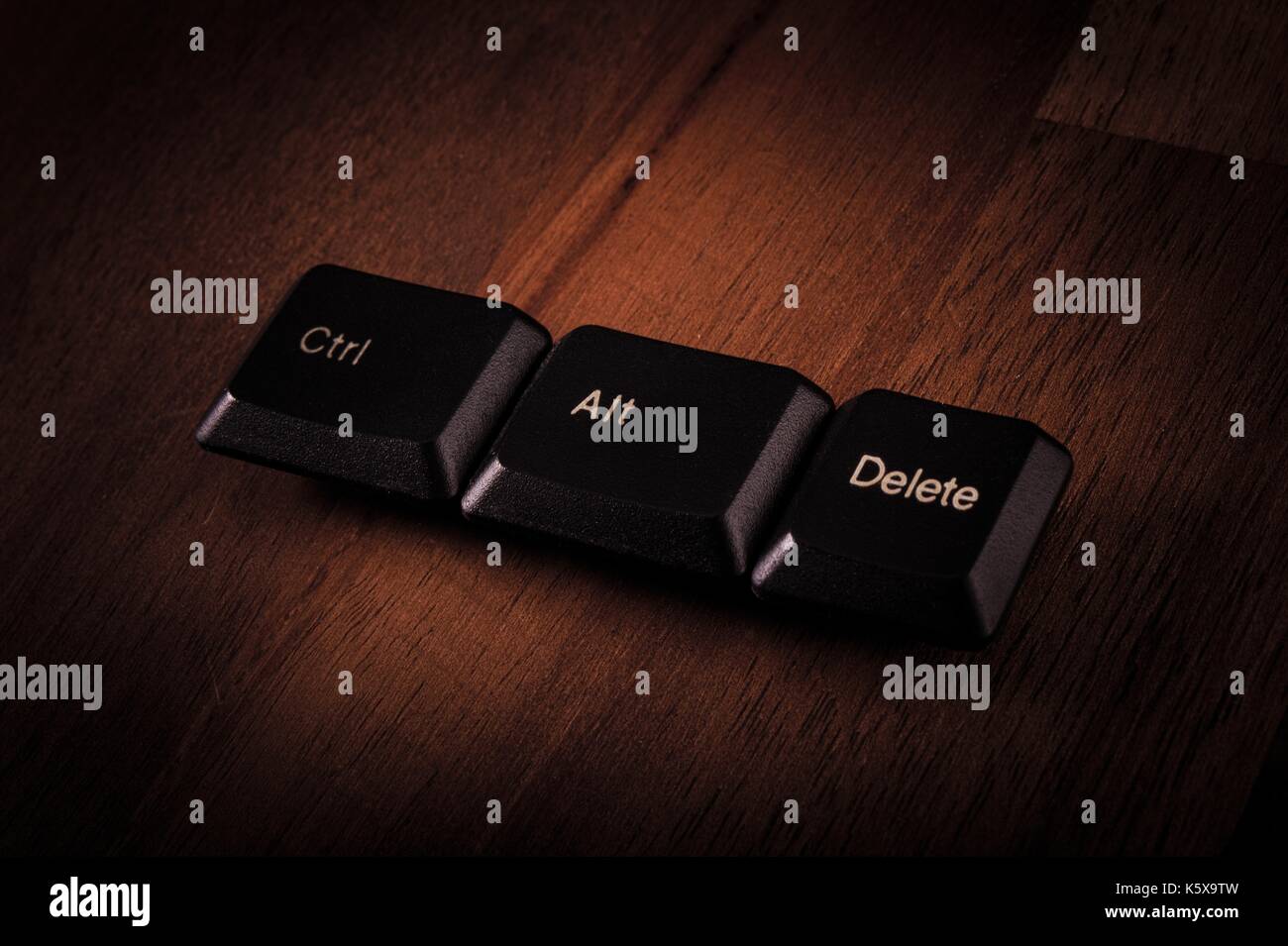 Ctrl alt del on wood surface Stock Photo - Alamy