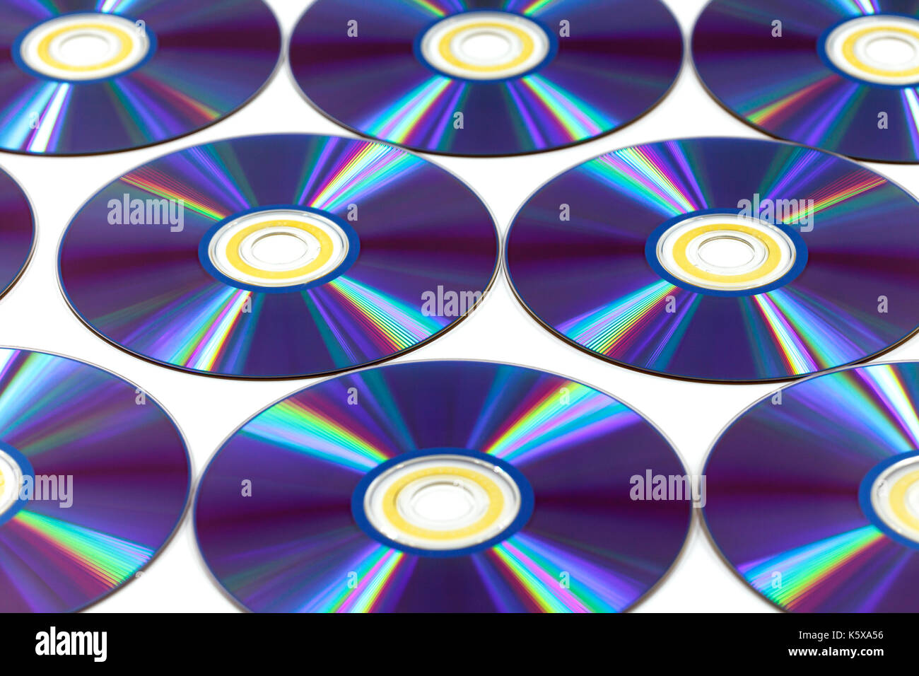 Bunch of cd discs on a white background Stock Photo - Alamy