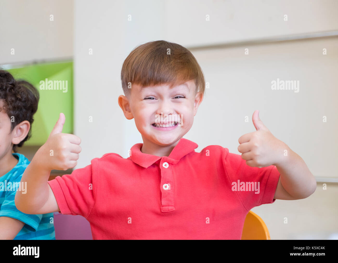 Mixed race classroom primary hi-res stock photography and images - Alamy