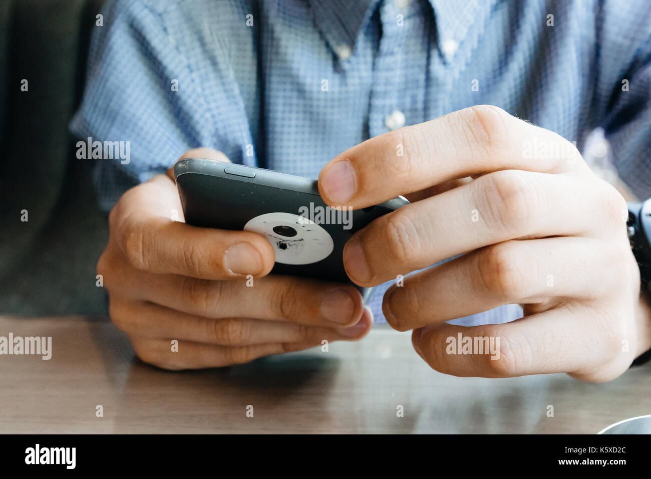 Male hands using smart hi-res stock photography and images - Alamy