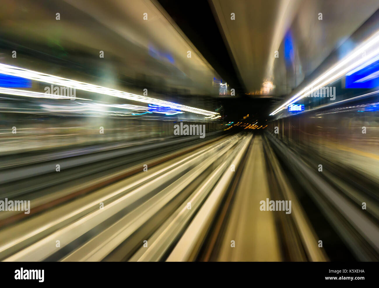 Motion blur train moving in city rail tunnel. Motion blur background ...