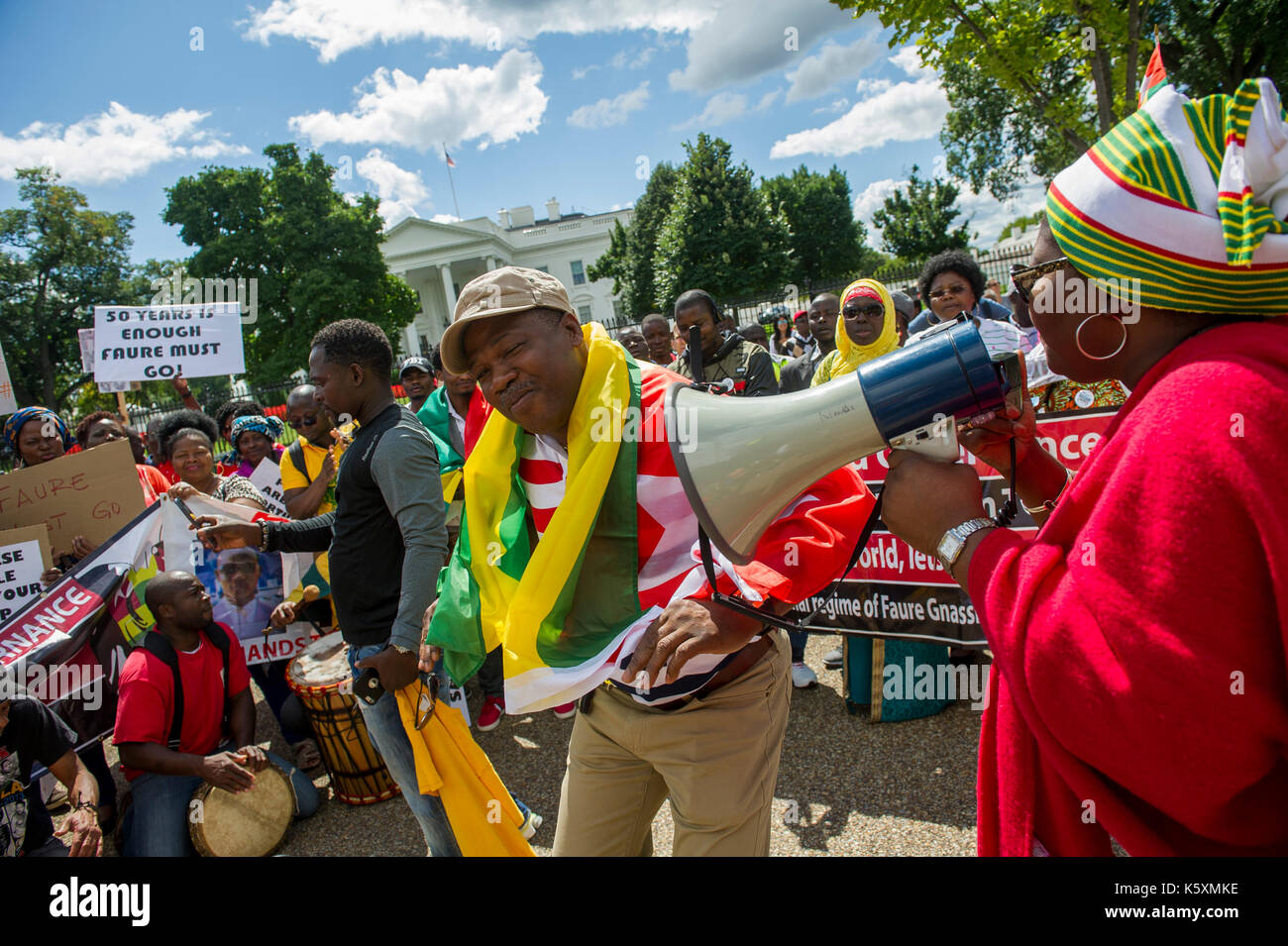 A small crowd gathers in front of the White House to protest Togo ...