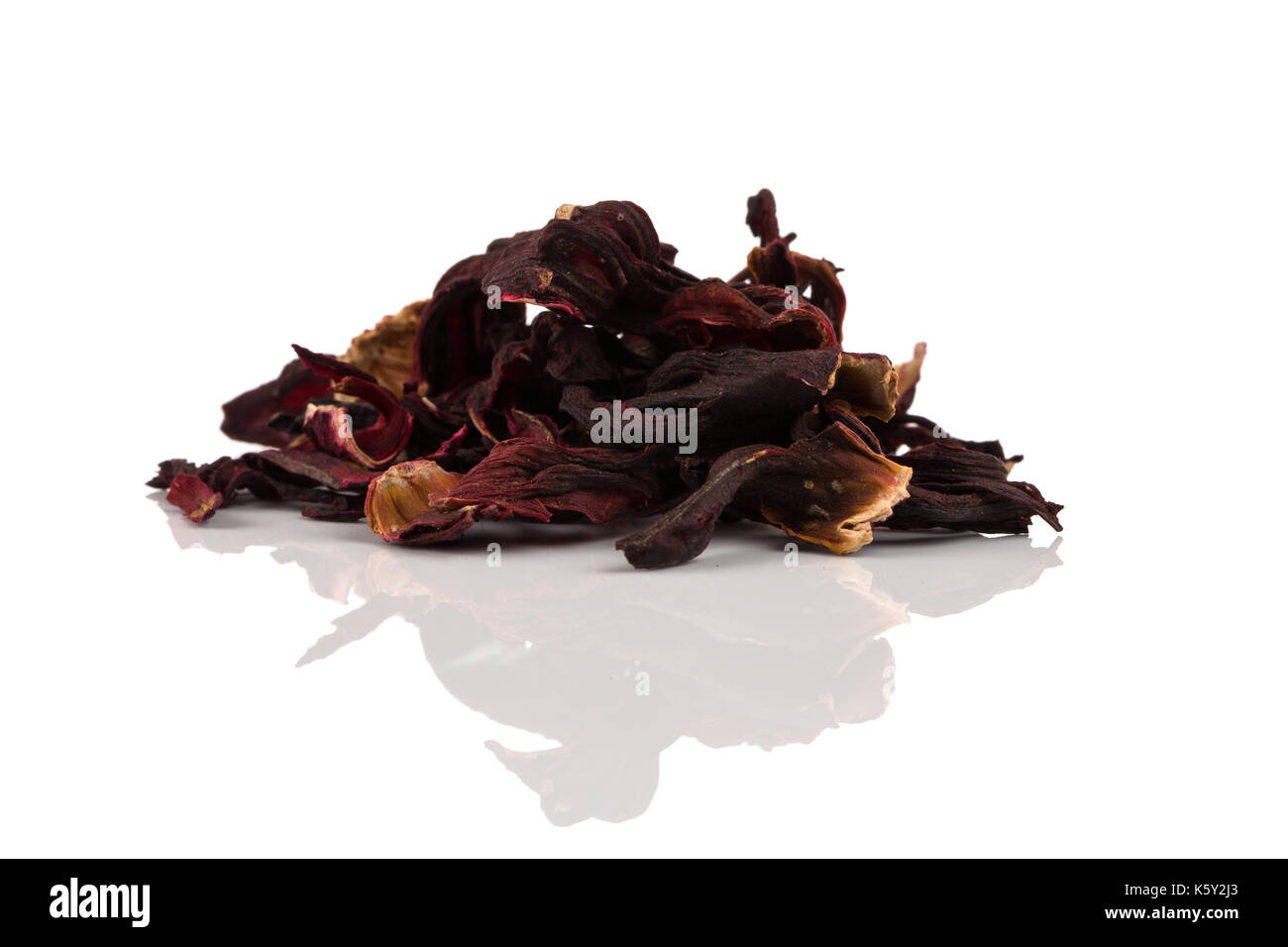 Heap of aromatic Hibiscus tea (karkade), isolated on white background ...