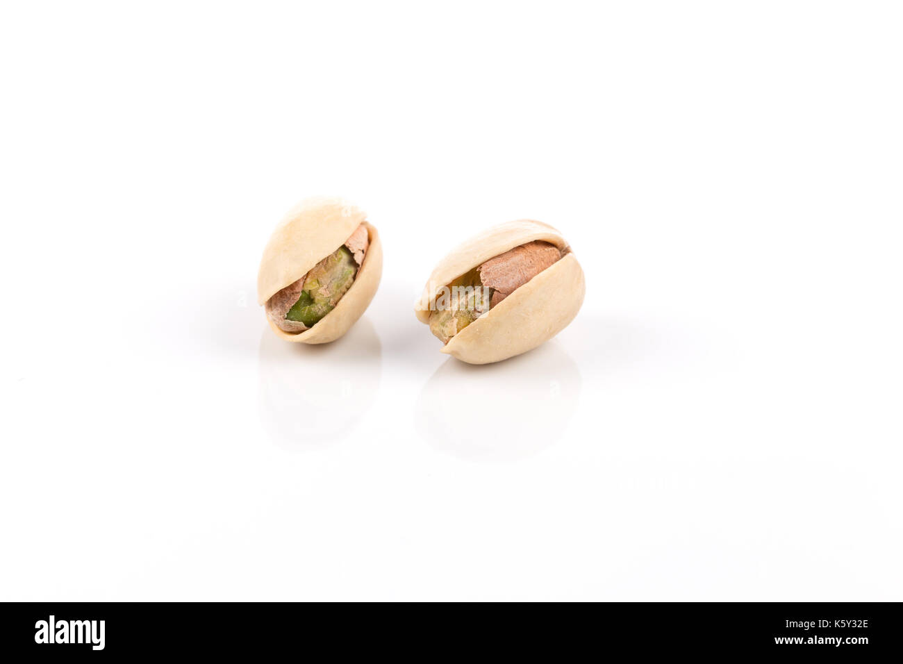pistachio nut close up on white background isolated Stock Photo - Alamy